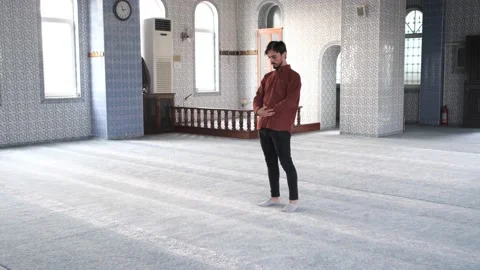 Front view of a man standing and prostra... | Stock Video | Pond5