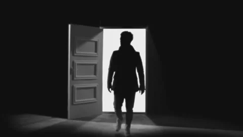 Front view of man walking in front of an... | Stock Video | Pond5