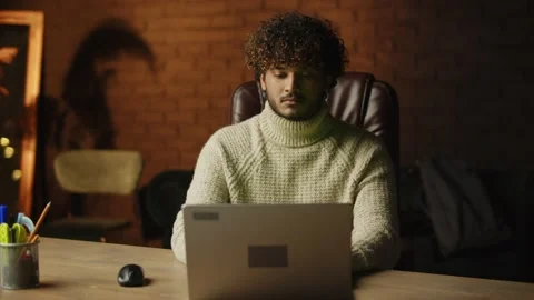 Front view of a man working with laptop ... | Stock Video | Pond5