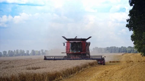 Front view of a modern combine on nature... | Stock Video | Pond5
