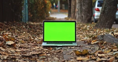 Front view of modern green screen laptop... | Stock Video | Pond5