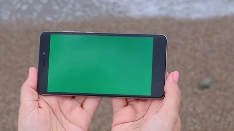 Front view of modern phone with blank gr... | Stock Video | Pond5