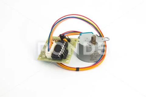 Front view of a step motor module and its driver module connected by ...