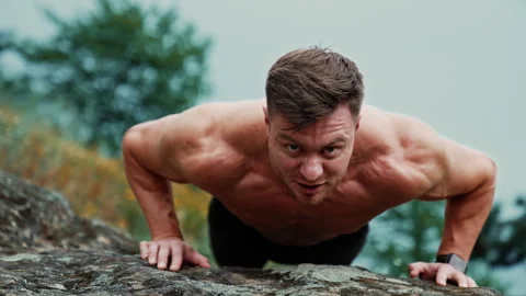 Front view of a strong man standing in p... | Stock Video | Pond5