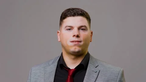 Front view studio shot a young man with ... | Stock Video | Pond5