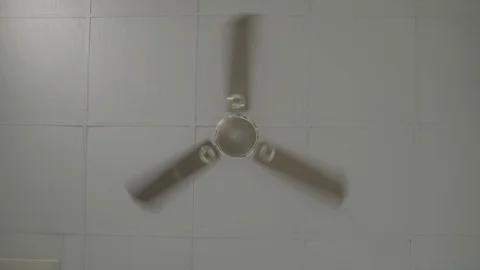 Front View of White Ceiling Fan - Shot o... | Stock Video | Pond5