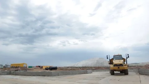 Front View Yellow Tipper Truck with Gyps... | Stock Video | Pond5