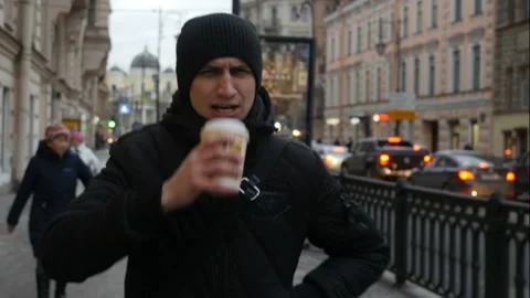 Front view of young man walking down the... | Stock Video | Pond5