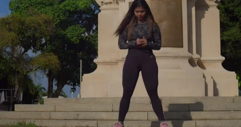 Frontal view of a female fitness model p... | Stock Video | Pond5