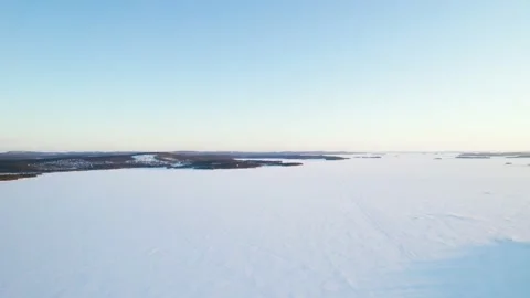 Frozen Inari lake in Finland Lapland | Stock Video | Pond5