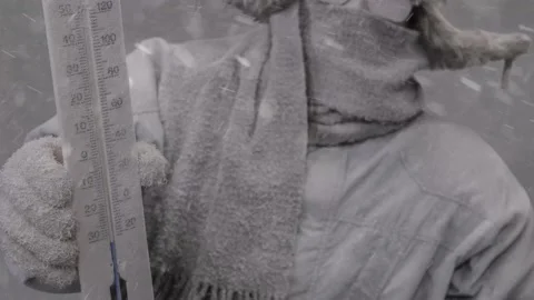 Frozen man in parka, trapper’s hat and... | Stock Video | Pond5