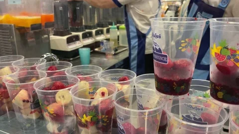 Fruit in plastic cup ready for blending ... | Stock Video | Pond5