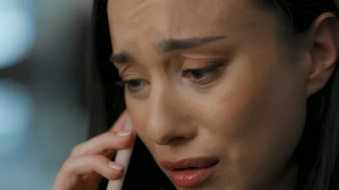 Frustrated lady crying mobile at room cl... | Stock Video | Pond5