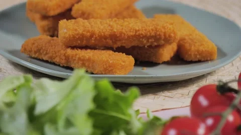 fry fish sticks view, tasty seafood, cri... | Stock Video | Pond5