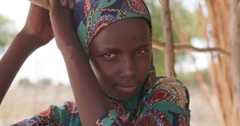 Fulani girl in Mali, West Africa - color... | Stock Video | Pond5