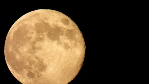 Full moon close up. Yellow moon in the n... | Stock Video | Pond5