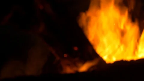 full moon reveal from middle of bonfire | Stock Video | Pond5