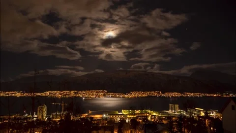 Full moon time lapse over small town by ... | Stock Video | Pond5