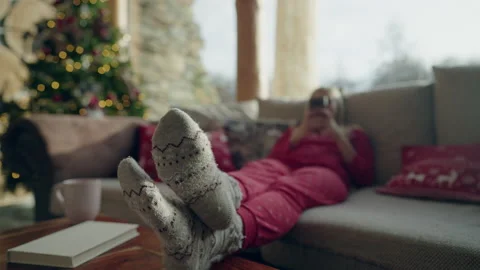 Full shot - A woman wiggling her toes in... | Stock Video | Pond5