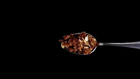A Full Spoon Of cereals Flying up and Fa... | Stock Video | Pond5