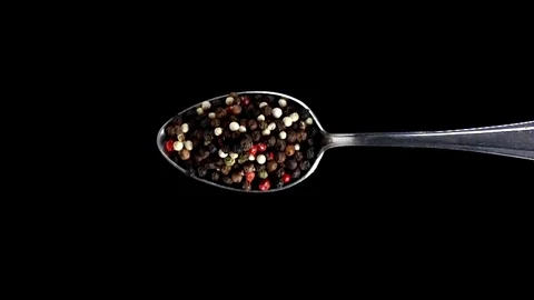 A Full Spoon Of falling mix peppercorns ... | Stock Video | Pond5