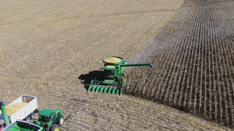 Fully loaded Combine turning on headland... | Stock Video | Pond5