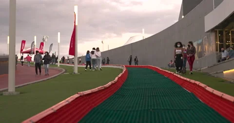 fun on a tubby slide in quest , people s... | Stock Video | Pond5