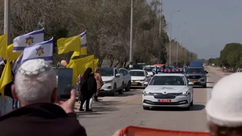 Funeral procession for Bibas family arri... | Stock Video | Pond5