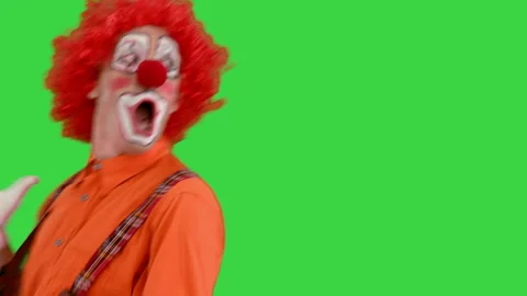 Funny clown running away from someone on... | Stock Video | Pond5