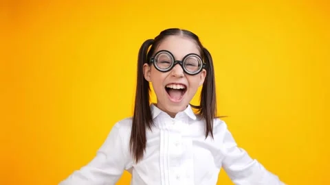 Funny crazy foolish schoolgirl having fu... | Stock Video | Pond5