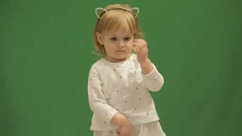 Funny cute child dancing. Slow motion. G... | Stock Video | Pond5