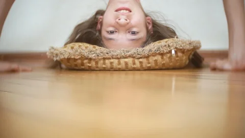 funny girl doing upside down pushups in ... | Stock Video | Pond5