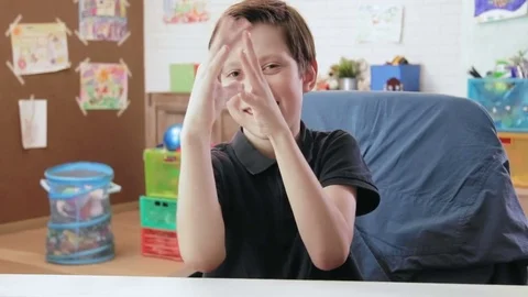 Funny little boy showing goofy gestures ... | Stock Video | Pond5