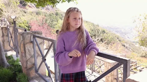 Funny little girl explaining something t... | Stock Video | Pond5