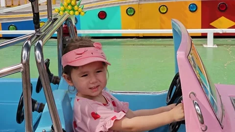 Funny Little Girl Pretend Driving Car Ri... | Stock Video | Pond5