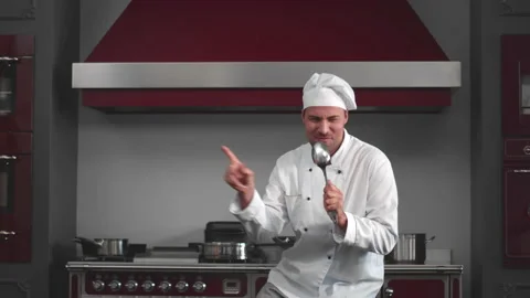 Funny male chef dance and sing with ladl... | Stock Video | Pond5