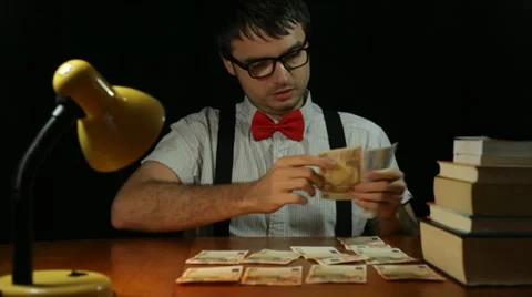 Funny nerd man counting money at night | Stock Video | Pond5