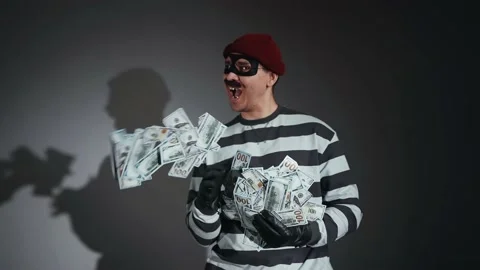 funny scammer thief in mask and Prison U... | Stock Video | Pond5