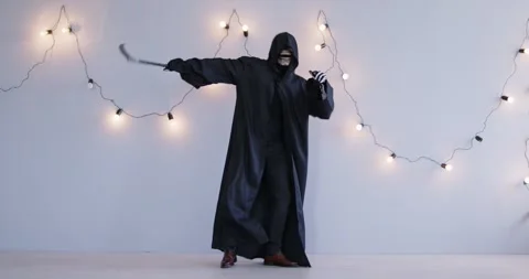 Funny scary Halloween Grim Reaper horrif... | Stock Video | Pond5