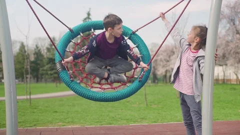 Funny Silly Children Playing On Swing At... | Stock Video | Pond5
