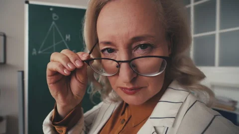 Funny strict mathematics teacher in her ... | Stock Video | Pond5