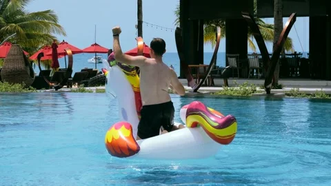 Funny video young man falling in pool in... | Stock Video | Pond5