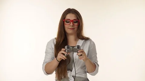 Funny woman with controller console 4K | Stock Video | Pond5