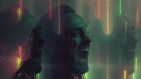 Furious Man Screaming in Neon Lights | Stock Video | Pond5