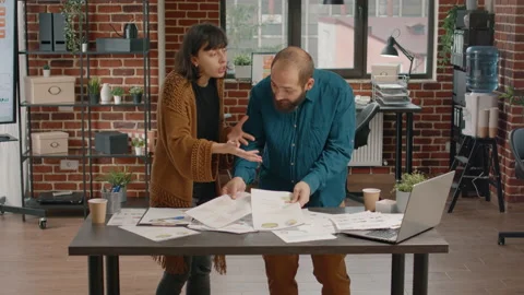 Furious man throwing chart papers in air... | Stock Video | Pond5