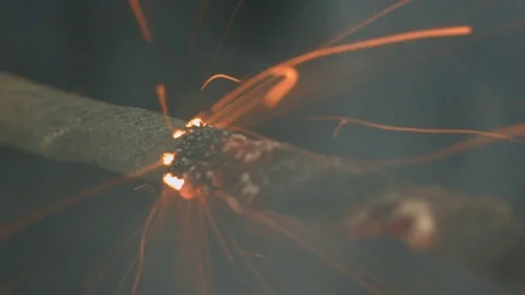 Fuse burns quickly with sparks and smoke... | Stock Video | Pond5