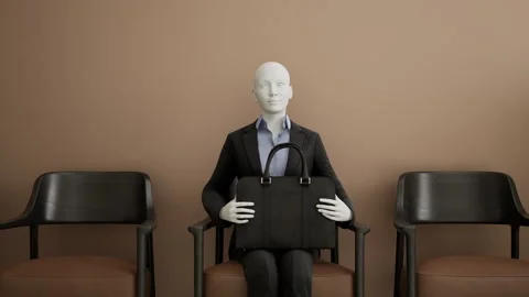 Futuristic female android robot sitting ... | Stock Video | Pond5