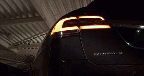 futuristic headlights of Tesla model X | Stock Video | Pond5