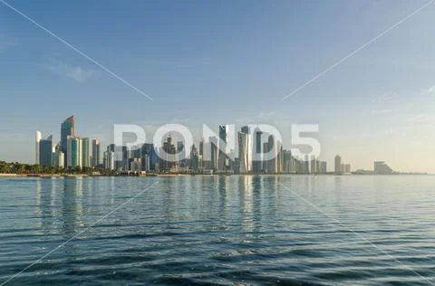 The futuristic urban skyline of Doha, Qatar ~ Premium Photo #133524644