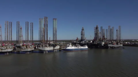 Galveston Texas off shore oil rigs in dr... | Stock Video | Pond5